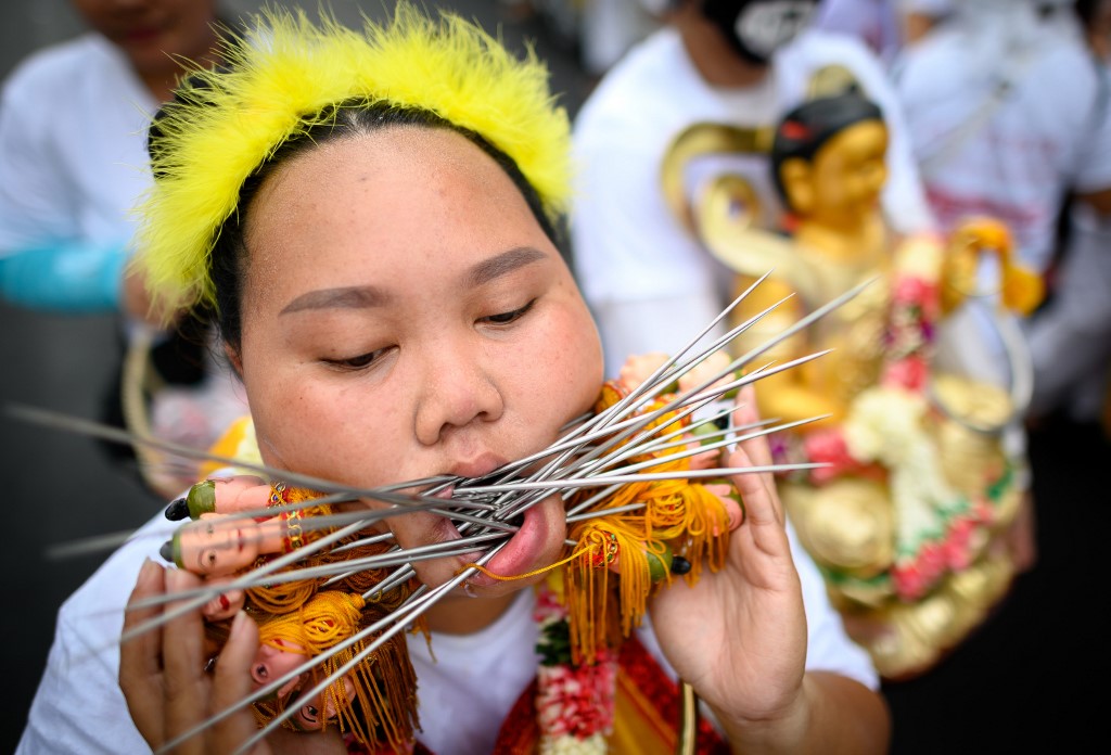 Piercing Needles, Walking on Embers: Phuket Vegetarian Festival | Al Bawaba