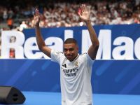 Kylian Mbappe poses with Real Madrid's No.9 shirt for first time