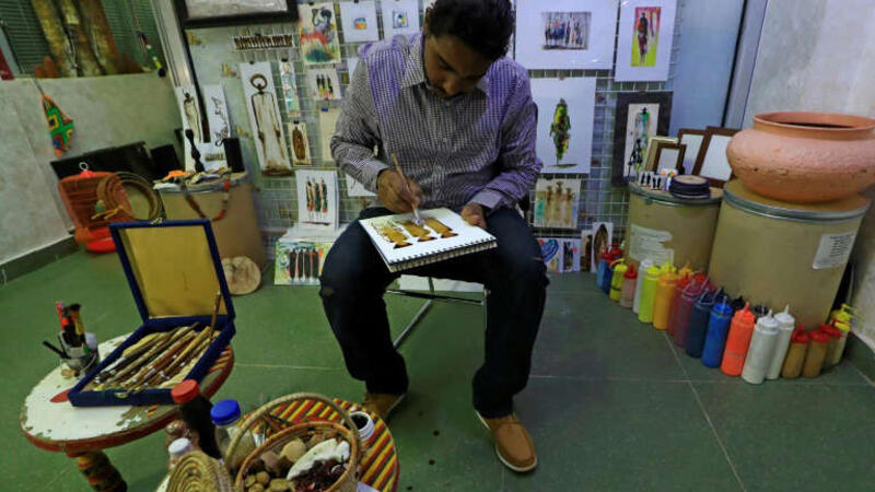 Sudanese Artist Mutaz Al Fateh Uses Coffee, Fruit Peel For Colors! (AFP ...