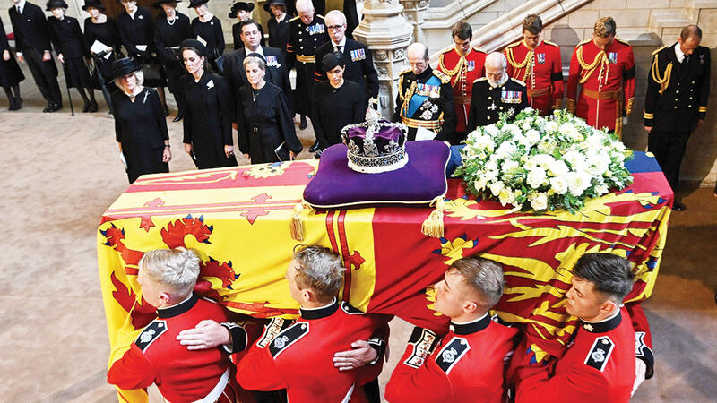 Video: Royal Guard Collapses Near Queen's Coffin | Al Bawaba