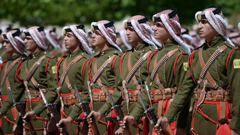 Jordanian honour guards parade during an official welcoming ceremony ...