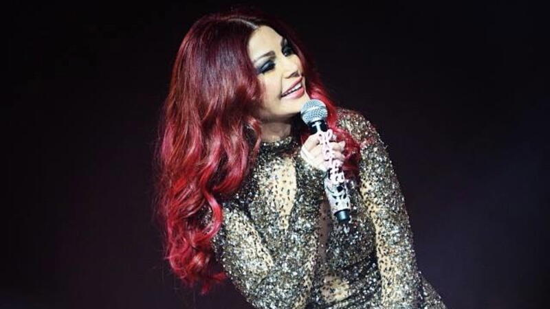 Is that Jessica Rabbit? Nope, it's only a newly REDhead Haifa Wehbe ...