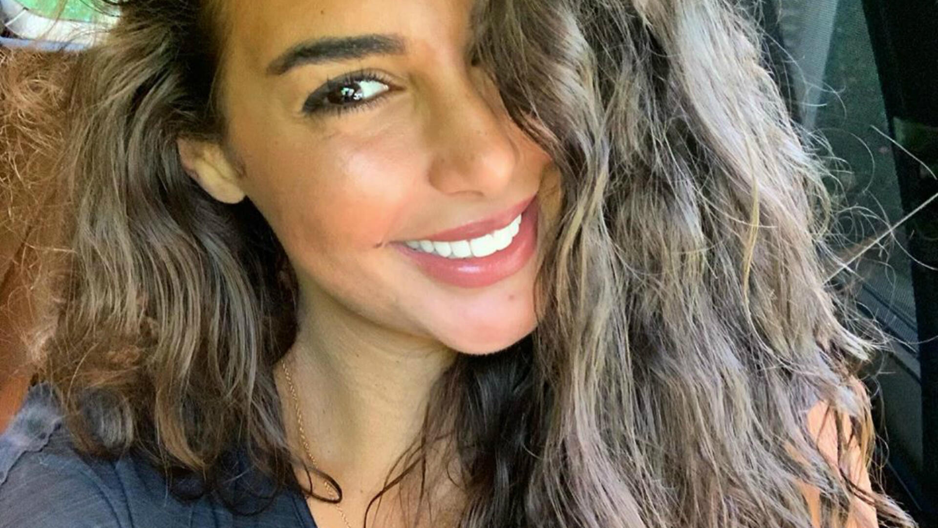 Relaxing! Yasmine Sabri Enjoys the Summer in the Swimming Pool | Al Bawaba