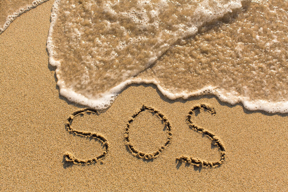 Giant SOS Sign in The Sand Saves Three Men on Tiny Pacific Island | Al ...