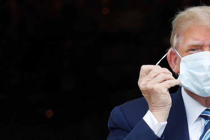 What Are The Band-Aids Spotted on The Back of Trump's Hand? | Al Bawaba