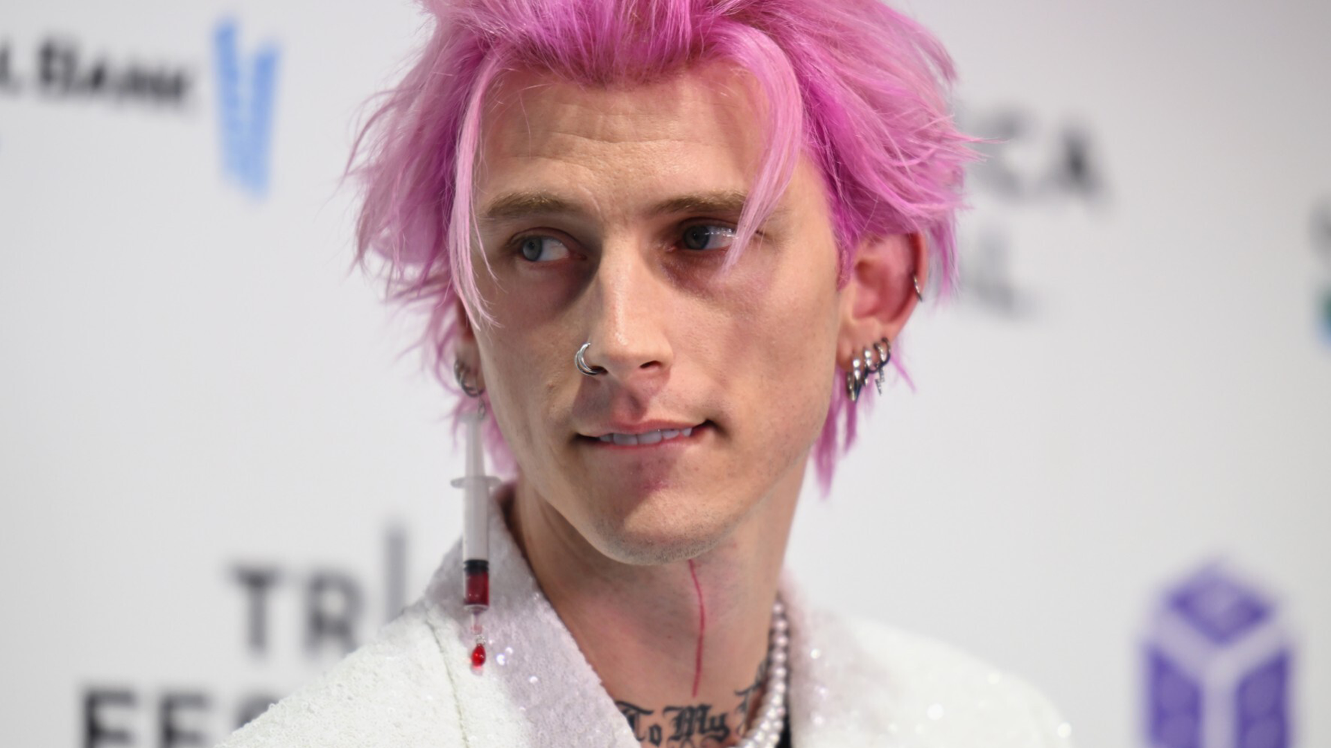 Who's Blood is it? MGK Wears a Syringe Full of Blood as an Earring | Al ...