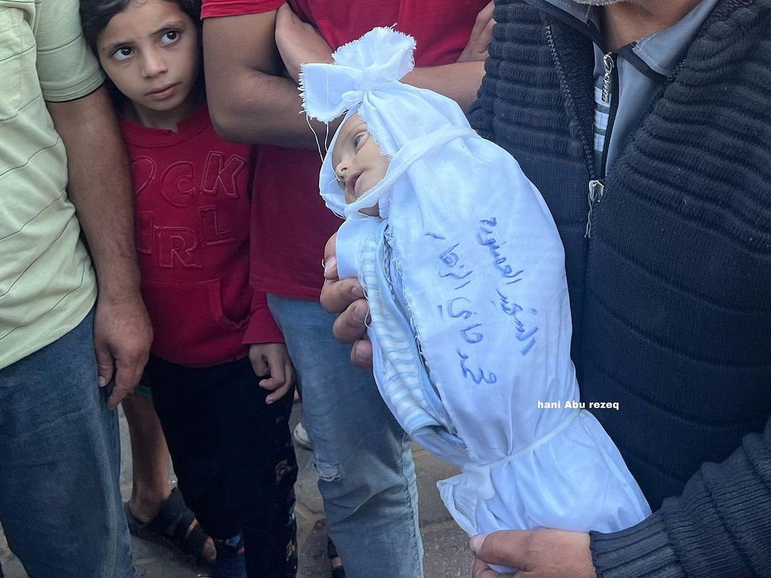 Palestinian baby with huge eyes doubted to be doll | Al Bawaba