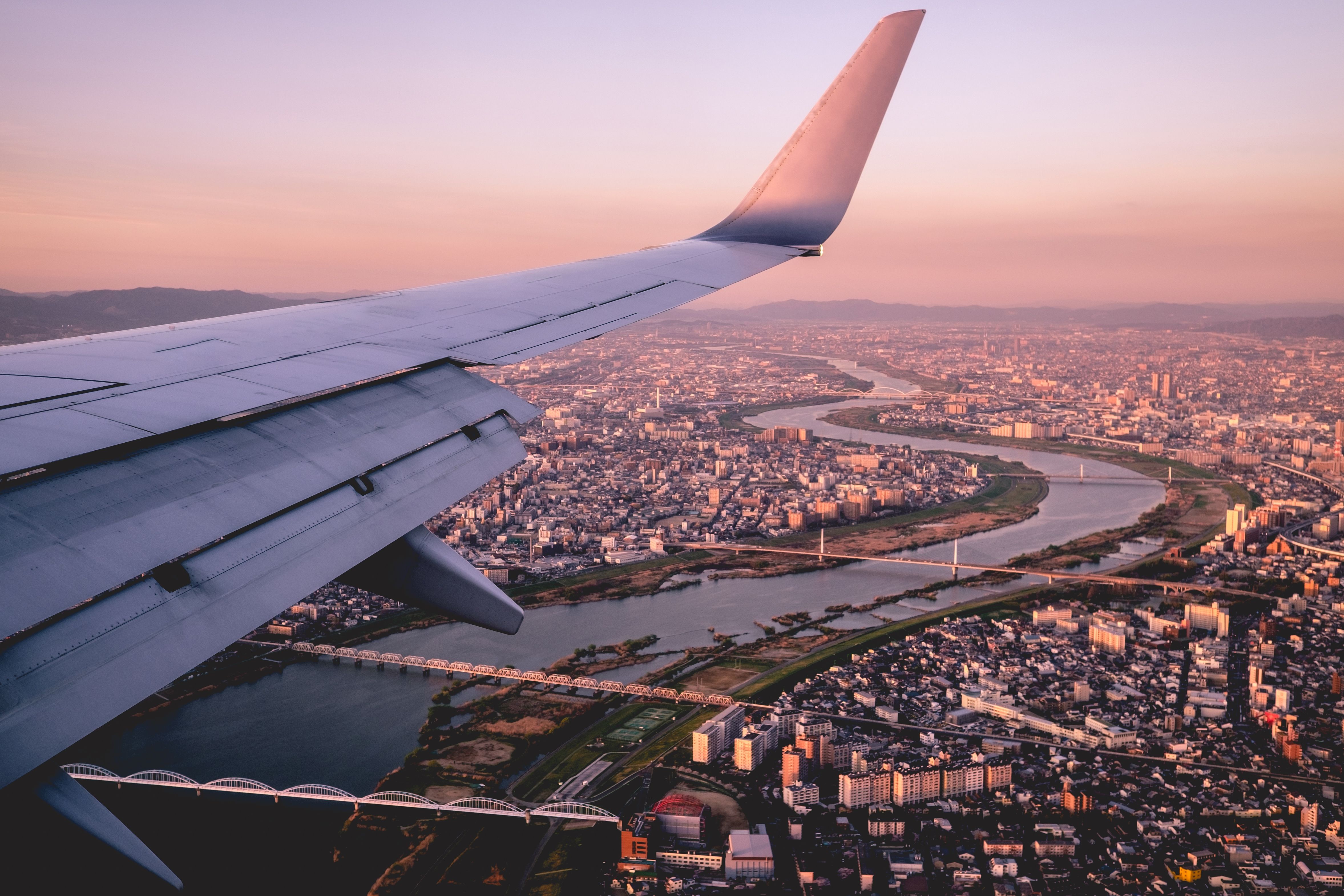 Japan plane turns back after passenger bites cabin attendant | Al Bawaba