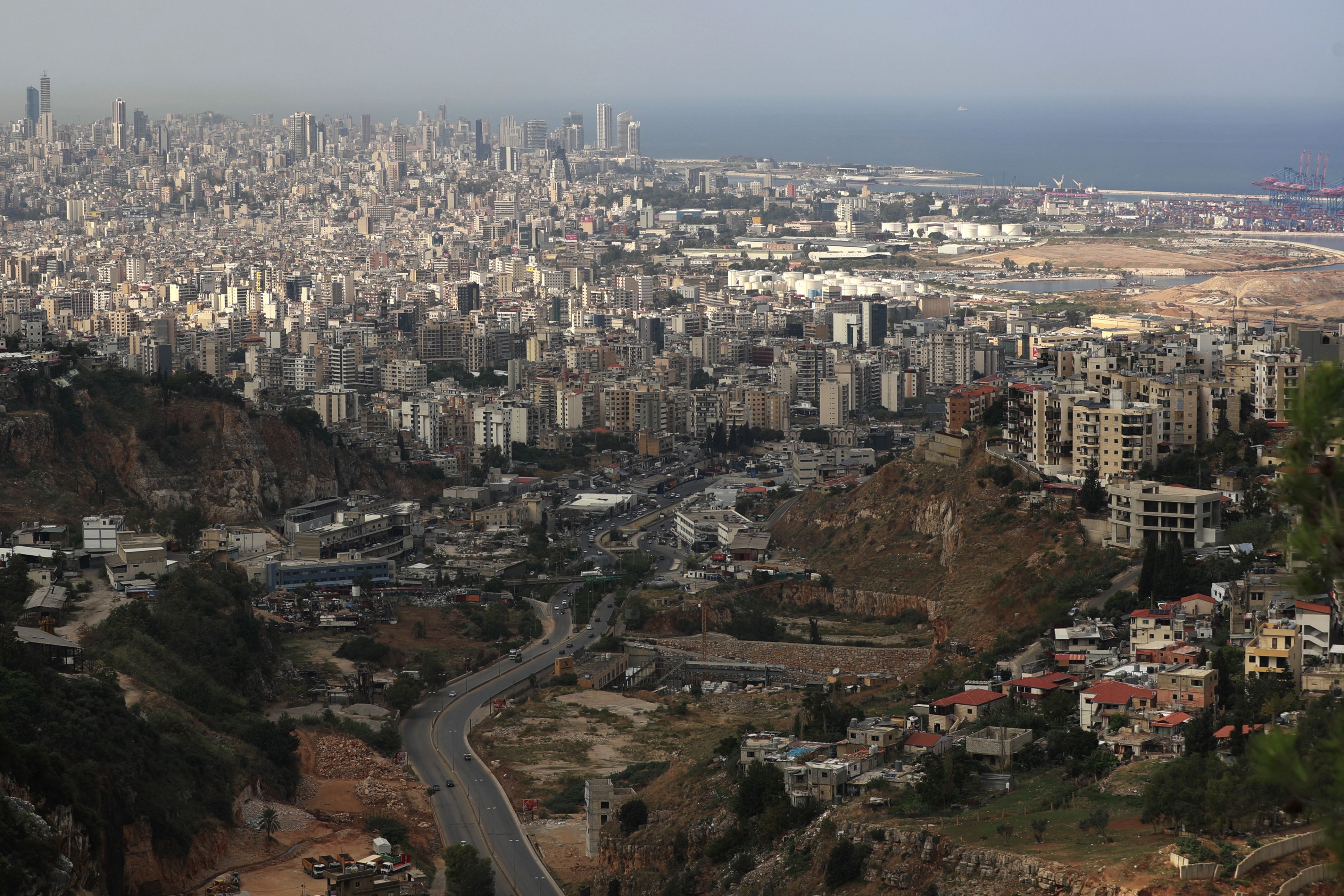 Building collapses in Beirut killing 4, search for survivors continues ...
