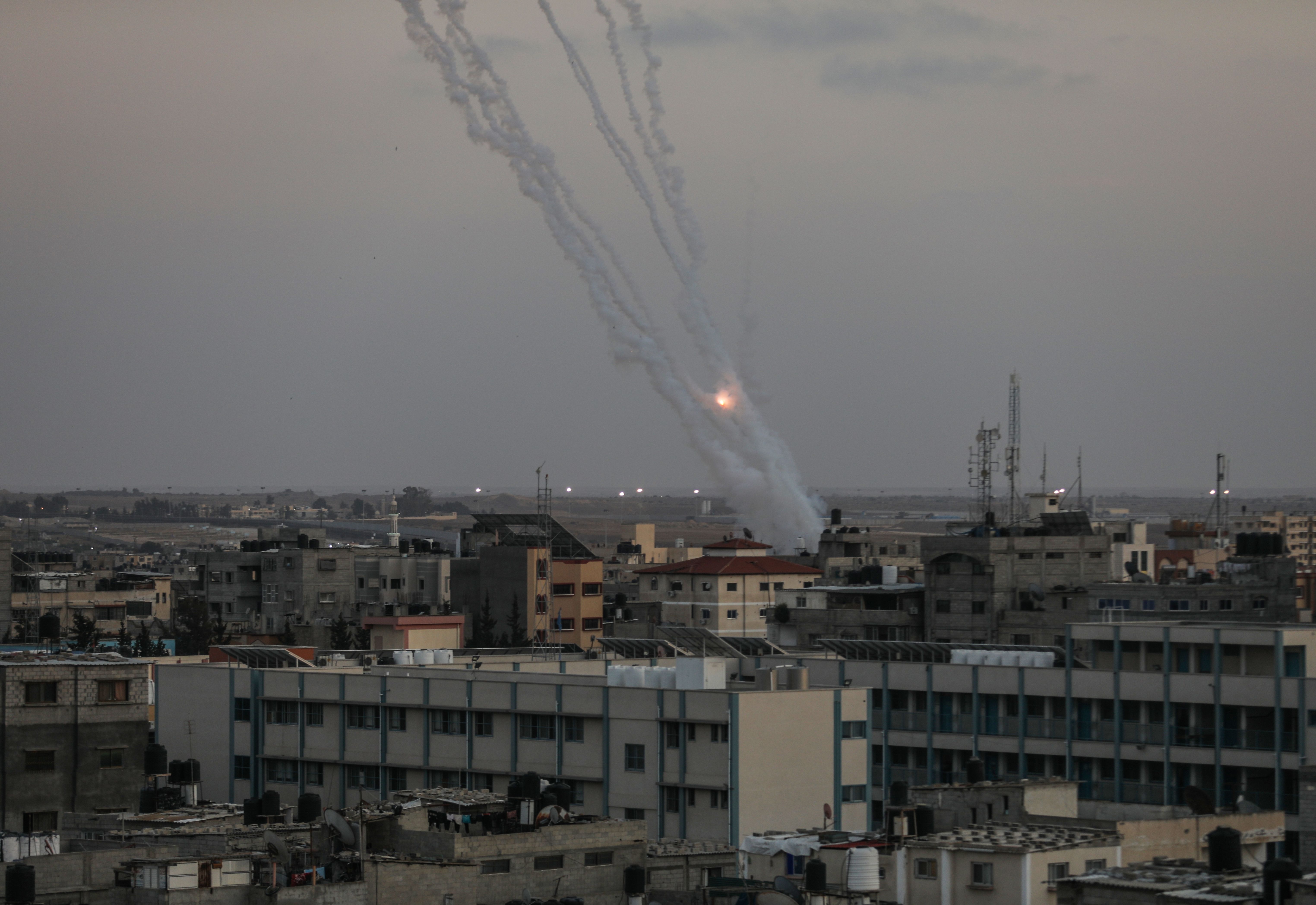 Staff members of Al Jazeera evacuate Beirut building following a ...