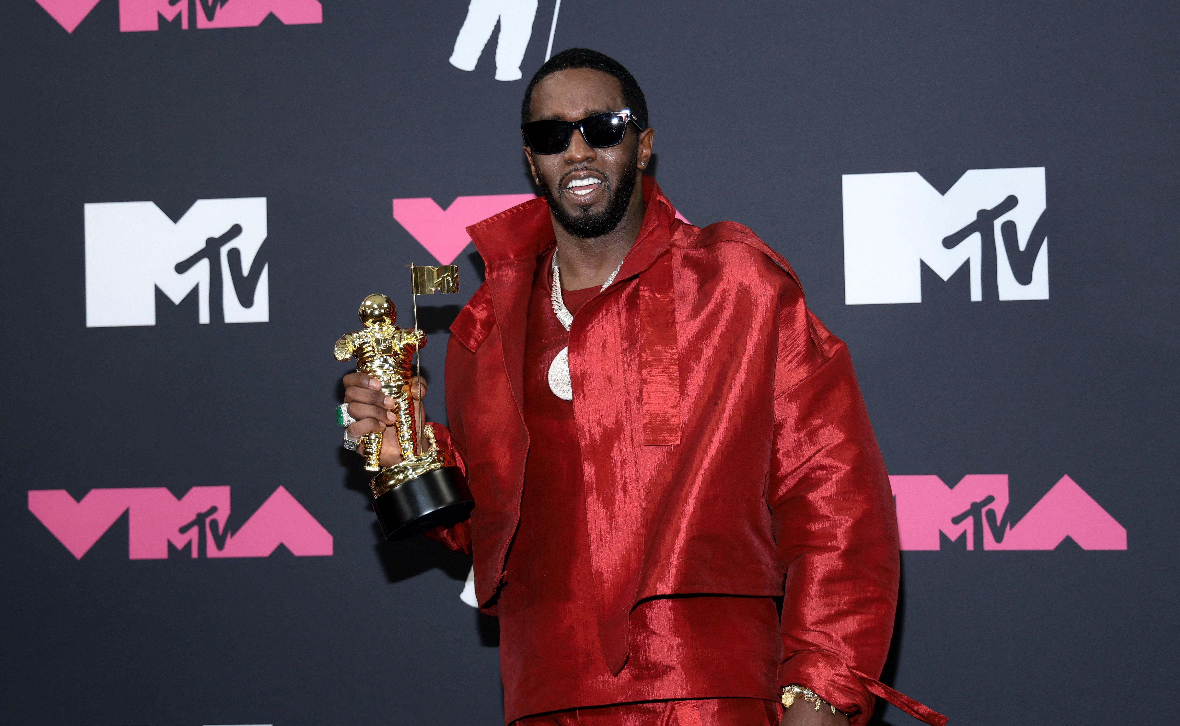 Diddy indictment Update: Prosecutors say he dangled victim over balcony ...
