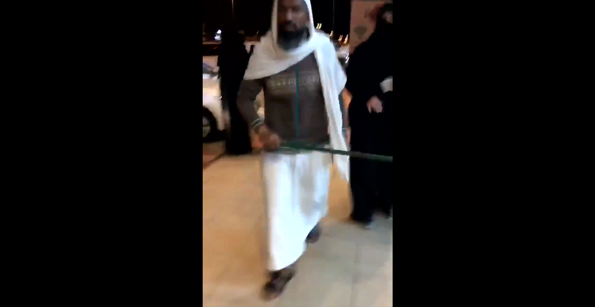 Saudi Religious Police Chases Woman with Stick Threatening Her to Cover ...