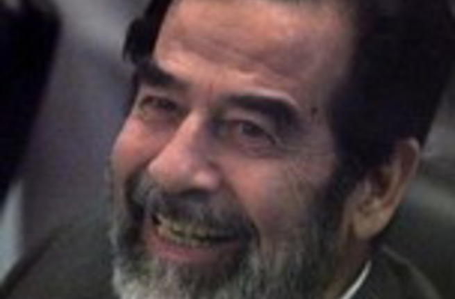 Saddam returns to court with smile | Al Bawaba