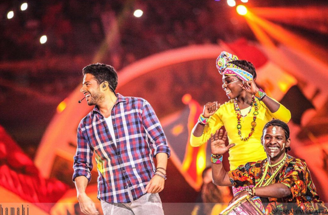 Multilingual Mohamed! Hamaki sings new song in 4 languages | Al Bawaba