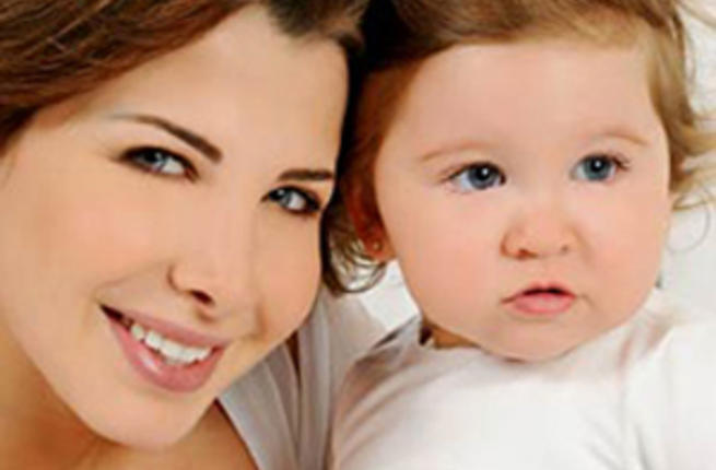 Nancy Ajram and her daughter on magazine cover | Al Bawaba