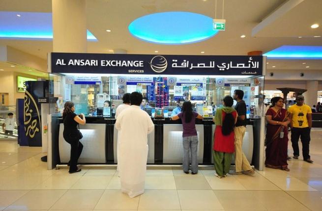 Al Ansari Exchange signs agreement with NBAD to accept credit card bill ...