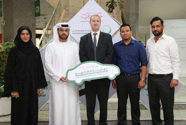 DEWA delivers three electric cars to winners of Smart Services campaign ...
