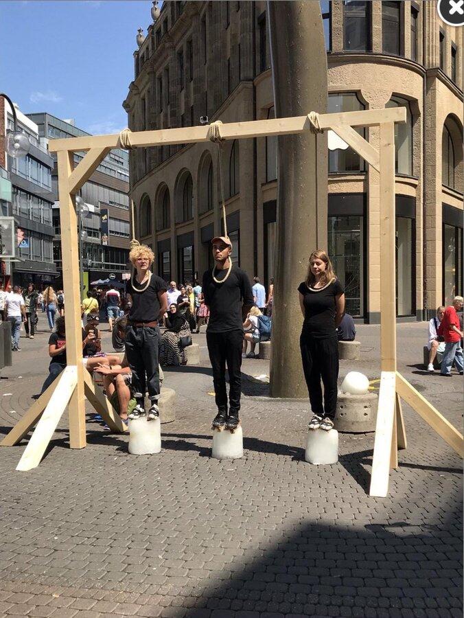 German Activists Stand on Ice Blocks Tied to Ropes Protesting Climate ...